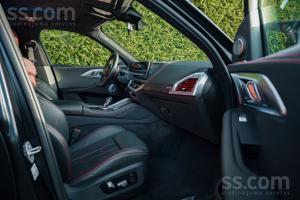 Black BMW XM 2024 in Riga, with an engine capacity of 4.40 L and mileage of 54 thousand km for 135000 €, photo 14 on AUTOMOTO.COM.LV