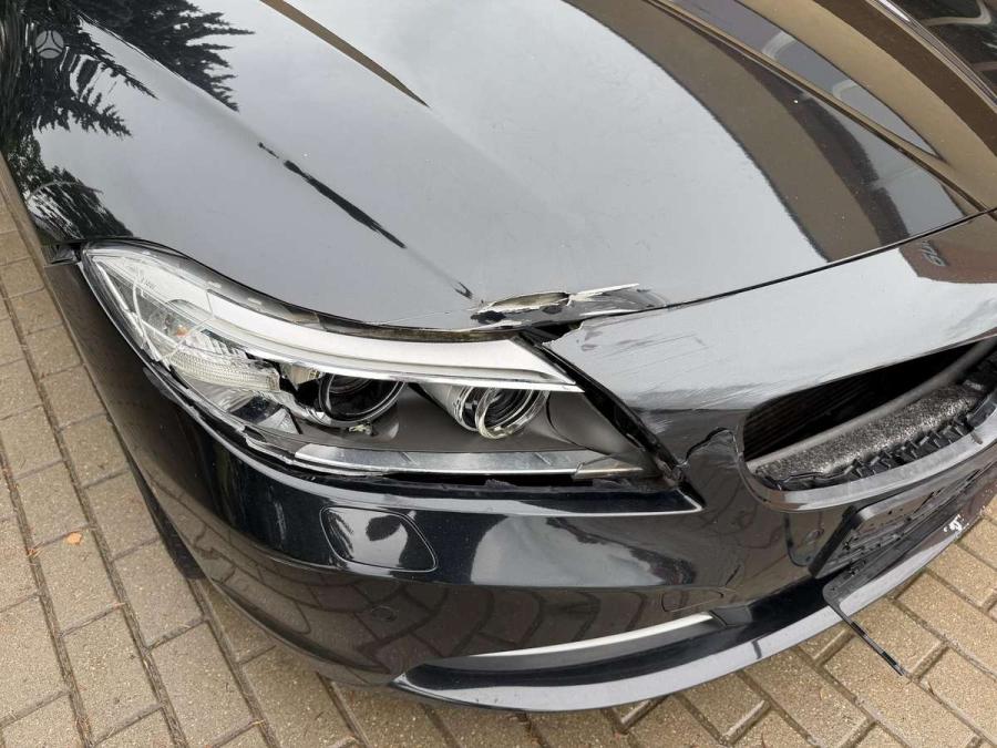 Black BMW Z4 2014 in Kaunas, with an engine capacity of 2.00 L and mileage of 167 thousand km for 9999 €, photo 14 on AUTOMOTO.COM.LV