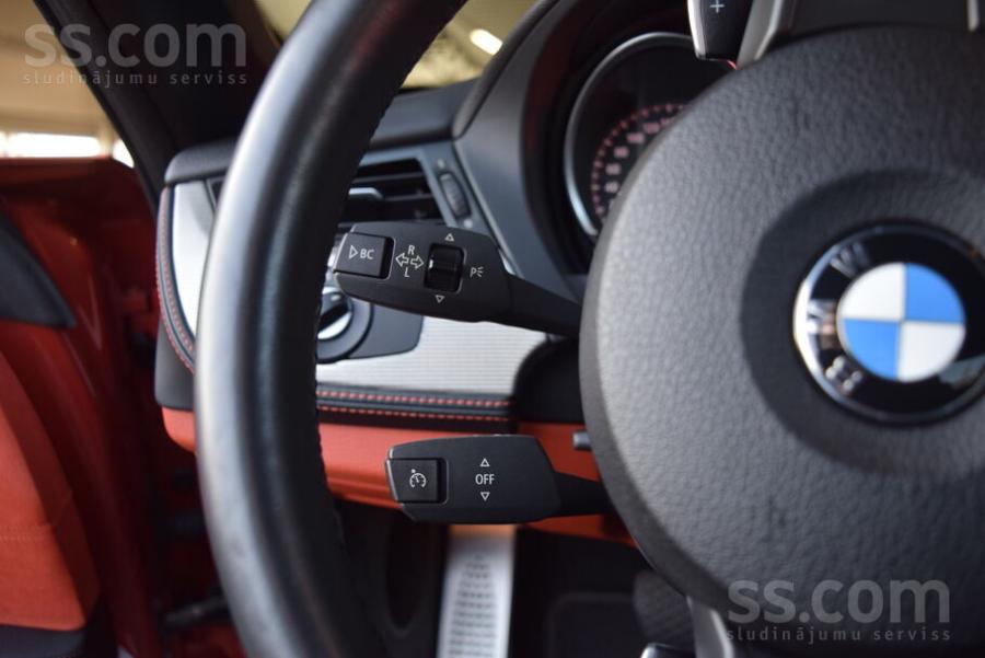 Orange BMW Z4 2014 in Riga, with an engine capacity of 2.00 L and mileage of 34 thousand km for 24900 €, photo 13 on AUTOMOTO.COM.LV