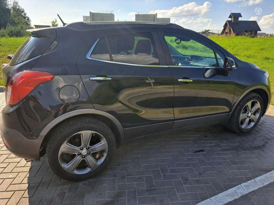 Black Buick Encore 2014 in Kaunas, with an engine capacity of 1.36 L and mileage of 210 thousand km for 5650 €, photo 6 on AUTOMOTO.COM.LV