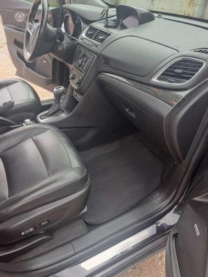 Black Buick Encore 2014 in Kaunas, with an engine capacity of 1.36 L and mileage of 210 thousand km for 5650 €, photo 16 on AUTOMOTO.COM.LV