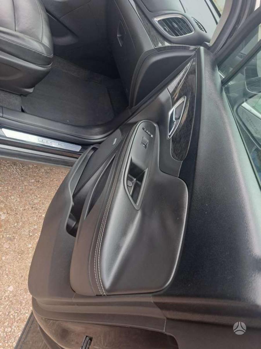 Black Buick Encore 2014 in Kaunas, with an engine capacity of 1.36 L and mileage of 210 thousand km for 5650 €, photo 17 on AUTOMOTO.COM.LV