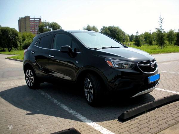 Black Buick Encore 2021 in Panevezys, with an engine capacity of 1.40 L and mileage of 42 thousand km for 12899 €, photo 1 on AUTOMOTO.COM.LV
