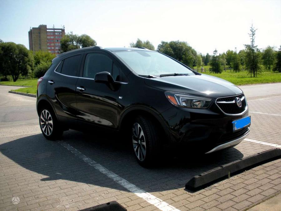 Black Buick Encore 2021 in Panevezys, with an engine capacity of 1.40 L and mileage of 42 thousand km for 12899 €, photo 1 on AUTOMOTO.COM.LV