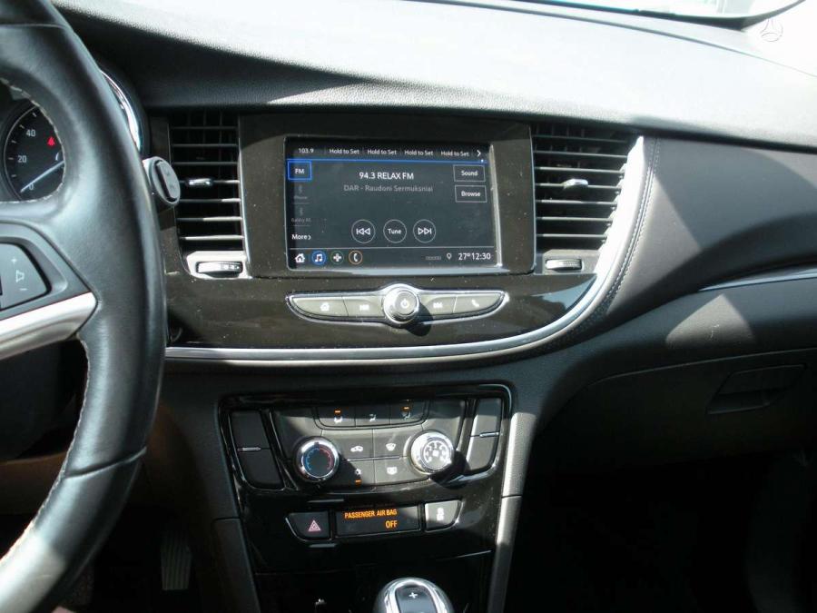 Black Buick Encore 2021 in Panevezys, with an engine capacity of 1.40 L and mileage of 42 thousand km for 12899 €, photo 12 on AUTOMOTO.COM.LV