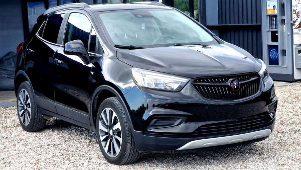 Black Buick Encore 2022 in Kretinga, with an engine capacity of 1.40 L and mileage of 64 thousand km for 11499 €, photo 1 on AUTOMOTO.COM.LV