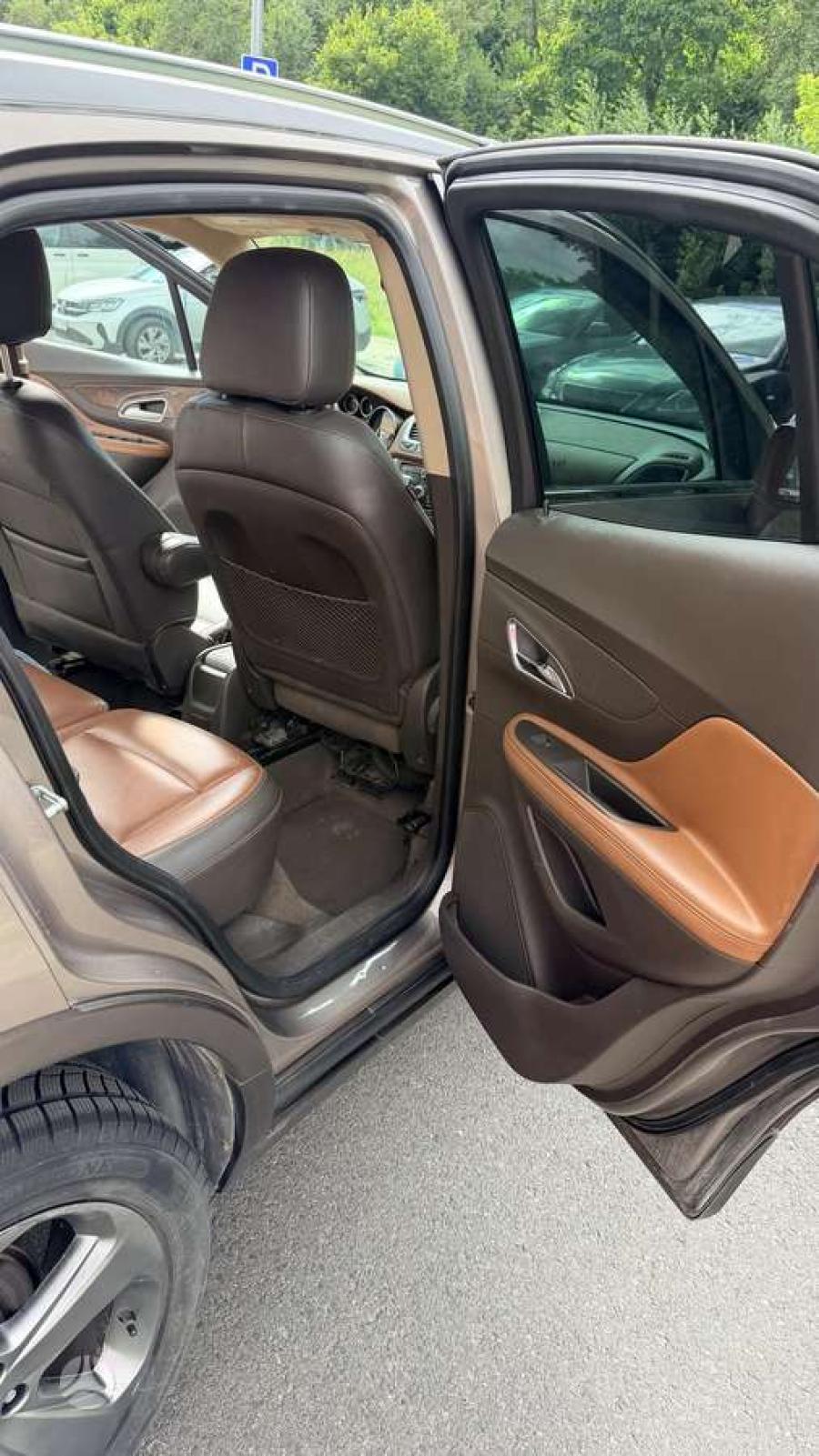 Brown Buick Encore 2013 in Vilnius, with an engine capacity of 1.36 L and mileage of 114 thousand km for 6000 €, photo 48 on AUTOMOTO.COM.LV