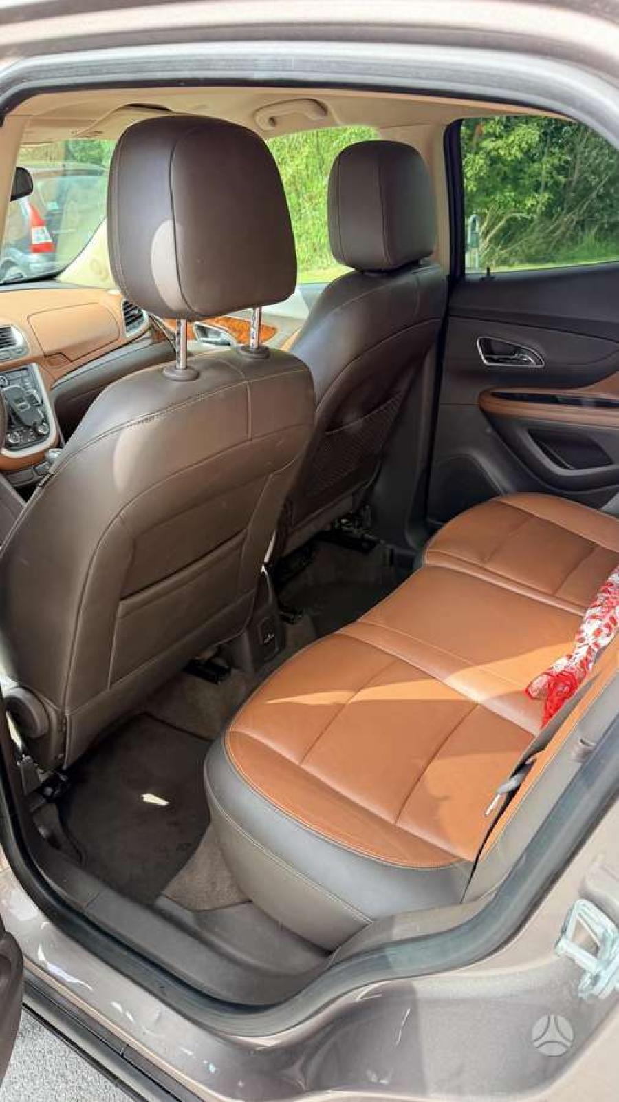 Brown Buick Encore 2013 in Vilnius, with an engine capacity of 1.36 L and mileage of 114 thousand km for 6000 €, photo 49 on AUTOMOTO.COM.LV