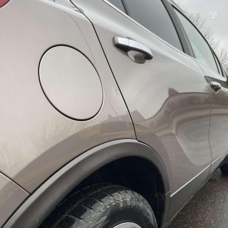 Brūns Buick Encore 2015 Šauļi, ar dzinēja tilpumu 1.36 L un nobraukumu 163 tūkst. km par 6799 €, foto 13 vietnē AUTOMOTO.COM.LV