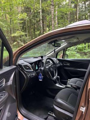 Brown Buick Encore 2016 in Vilnius, with an engine capacity of 1.36 L and mileage of 48 thousand km for 8200 €, photo 9 on AUTOMOTO.COM.LV