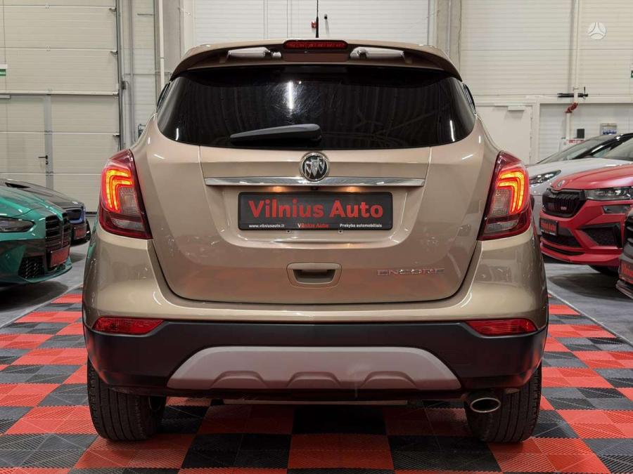 Brown Buick Encore 2019 in Vilnius, with an engine capacity of 1.36 L and mileage of 60 thousand km for 10490 €, photo 6 on AUTOMOTO.COM.LV