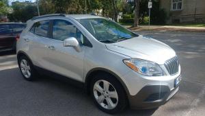 Grey Buick Encore 2016 in Vilnius, with an engine capacity of 1.36 L and mileage of 128 thousand km for 8199 €, photo 4 on AUTOMOTO.COM.LV