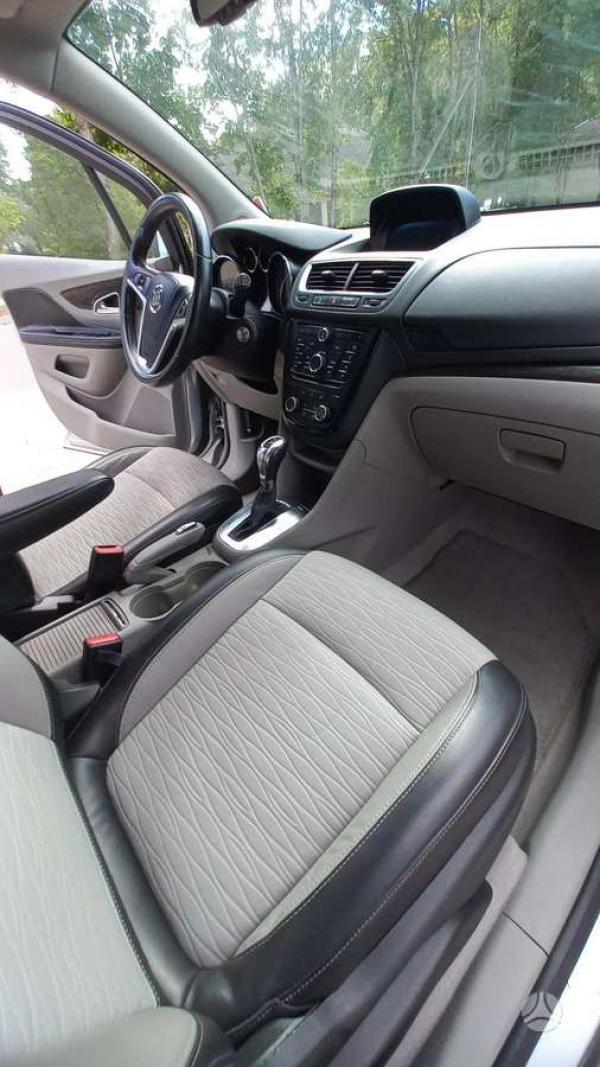 Grey Buick Encore 2016 in Vilnius, with an engine capacity of 1.36 L and mileage of 128 thousand km for 8199 €, photo 7 on AUTOMOTO.COM.LV