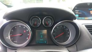 Grey Buick Encore 2016 in Vilnius, with an engine capacity of 1.36 L and mileage of 128 thousand km for 8199 €, photo 12 on AUTOMOTO.COM.LV