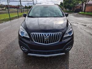 Red Buick Encore 2016 in Siauliai, with an engine capacity of 1.40 L and mileage of 186 thousand km for 7200 €, photo 3 on AUTOMOTO.COM.LV