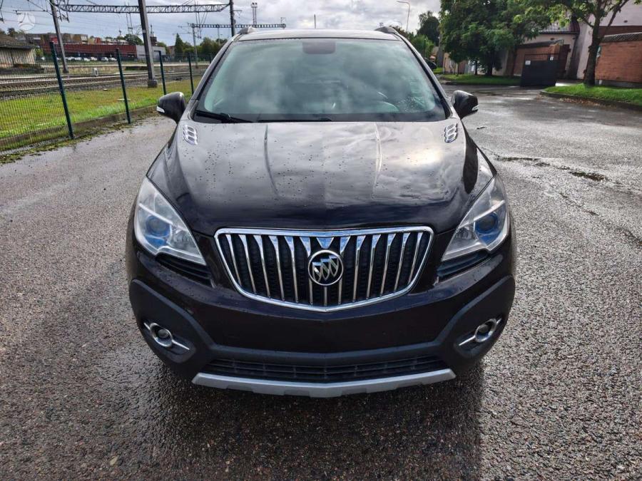 Red Buick Encore 2016 in Siauliai, with an engine capacity of 1.40 L and mileage of 186 thousand km for 7200 €, photo 3 on AUTOMOTO.COM.LV