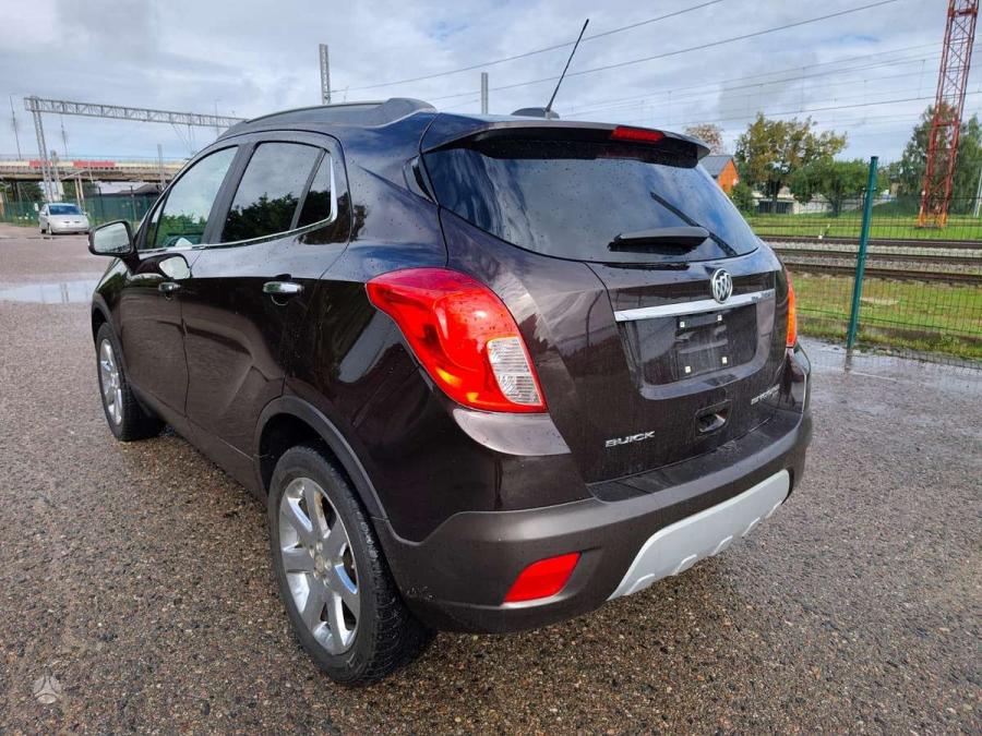 Red Buick Encore 2016 in Siauliai, with an engine capacity of 1.40 L and mileage of 186 thousand km for 7200 €, photo 5 on AUTOMOTO.COM.LV