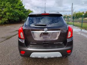 Red Buick Encore 2016 in Siauliai, with an engine capacity of 1.40 L and mileage of 186 thousand km for 7200 €, photo 6 on AUTOMOTO.COM.LV