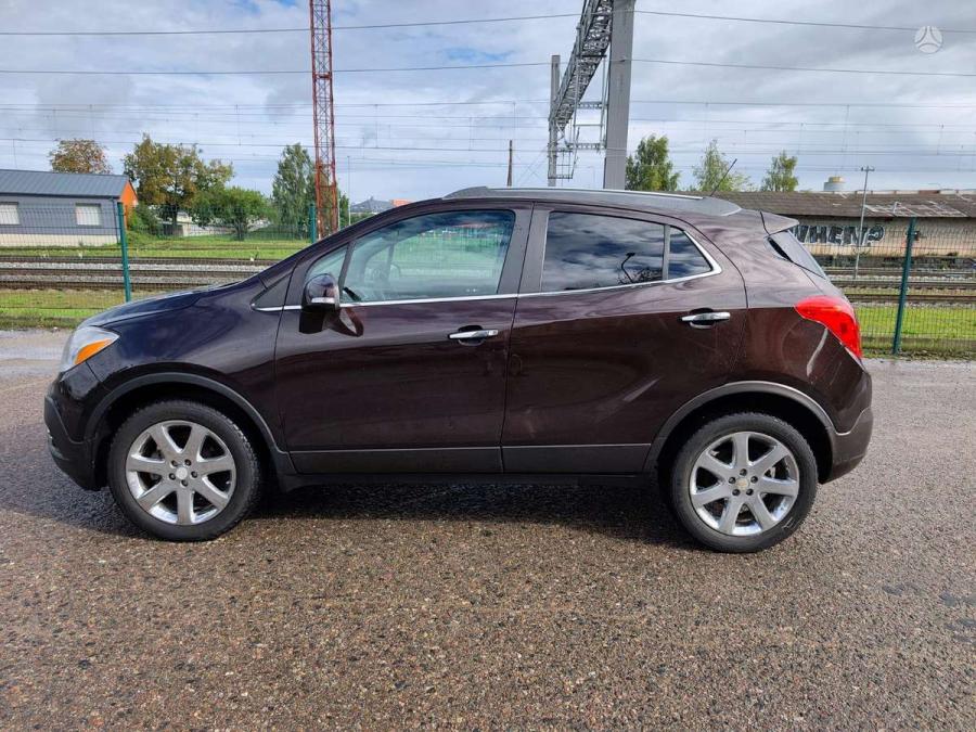Red Buick Encore 2016 in Siauliai, with an engine capacity of 1.40 L and mileage of 186 thousand km for 7200 €, photo 9 on AUTOMOTO.COM.LV