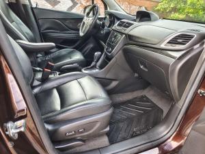 Red Buick Encore 2016 in Siauliai, with an engine capacity of 1.40 L and mileage of 186 thousand km for 7200 €, photo 14 on AUTOMOTO.COM.LV
