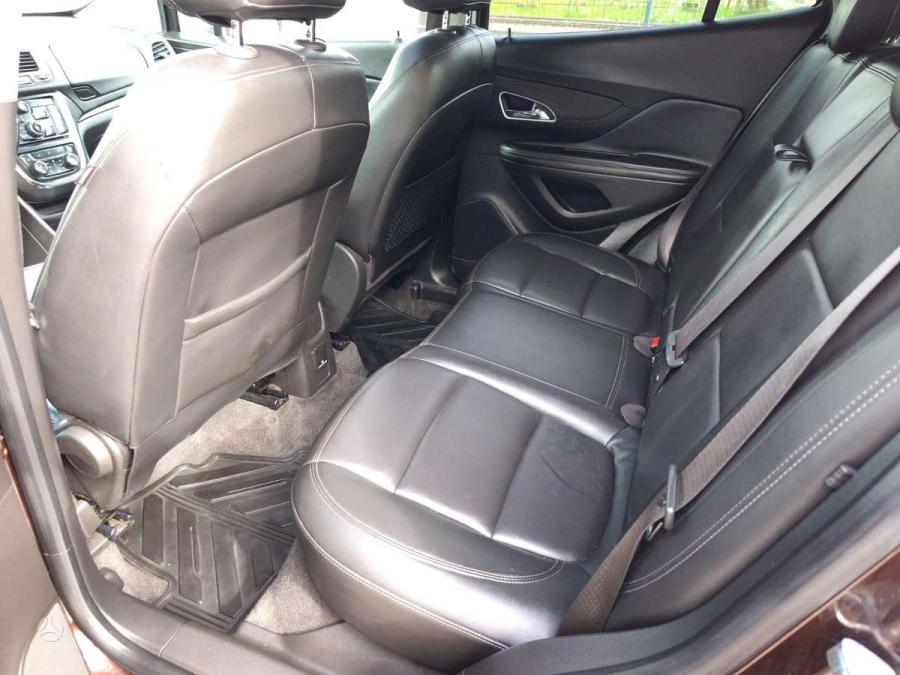 Red Buick Encore 2016 in Siauliai, with an engine capacity of 1.40 L and mileage of 186 thousand km for 7200 €, photo 15 on AUTOMOTO.COM.LV