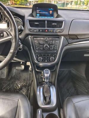 Red Buick Encore 2016 in Siauliai, with an engine capacity of 1.40 L and mileage of 186 thousand km for 7200 €, photo 17 on AUTOMOTO.COM.LV