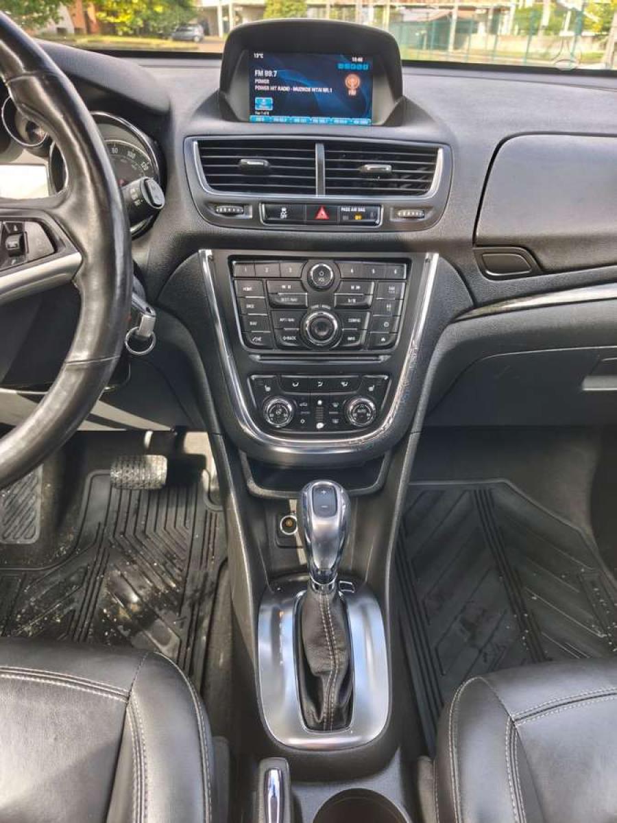 Red Buick Encore 2016 in Siauliai, with an engine capacity of 1.40 L and mileage of 186 thousand km for 7200 €, photo 17 on AUTOMOTO.COM.LV