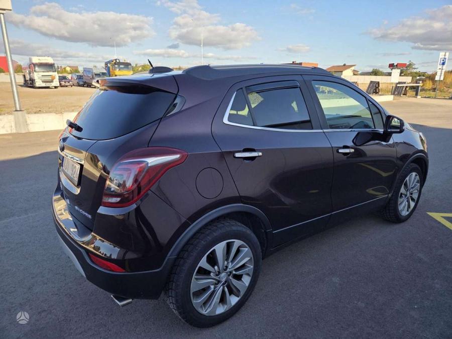 Red Buick Encore 2017 in Klaipeda, with an engine capacity of 1.36 L and mileage of 132 thousand km for 7300 €, photo 3 on AUTOMOTO.COM.LV