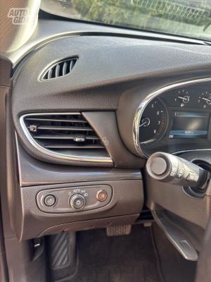 Red Buick Encore 2018 in Kaunas, with an engine capacity of 1.40 L and mileage of 183 thousand km for 10000 €, photo 18 on AUTOMOTO.COM.LV