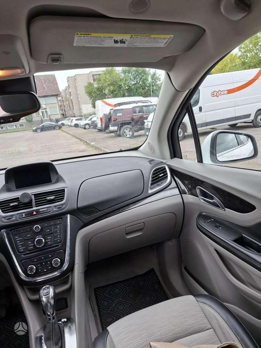 White Buick Encore 2016 in Klaipeda, with an engine capacity of 1.36 L and mileage of 72 thousand km for 7200 €, photo 10 on AUTOMOTO.COM.LV