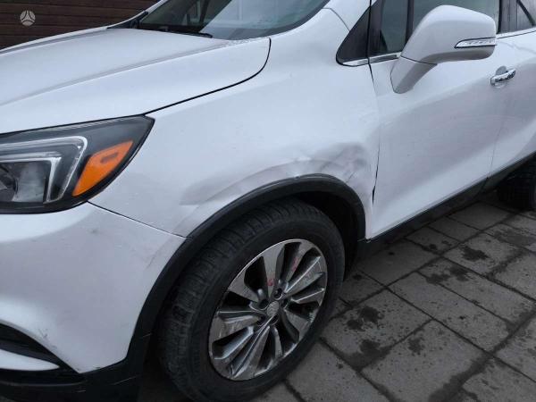 White Buick Encore 2017 in Siauliai, with an engine capacity of 1.36 L and mileage of 92 thousand km for 6500 €, photo 4 on AUTOMOTO.COM.LV