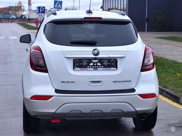 White Buick Encore 2017 in Siauliai, with an engine capacity of 1.40 L and mileage of 170 thousand km for 8450 €, photo 6 on AUTOMOTO.COM.LV
