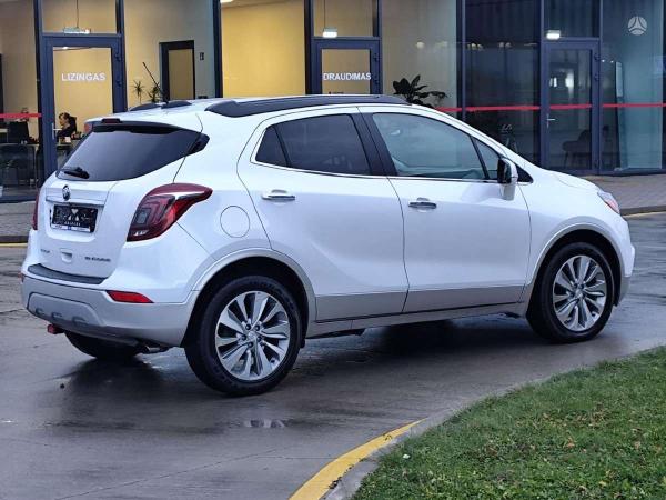 White Buick Encore 2017 in Siauliai, with an engine capacity of 1.40 L and mileage of 170 thousand km for 8450 €, photo 8 on AUTOMOTO.COM.LV