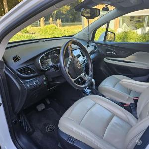 White Buick Encore 2018 in Telschi, with an engine capacity of 1.36 L and mileage of 50 thousand km for 10500 €, photo 11 on AUTOMOTO.COM.LV