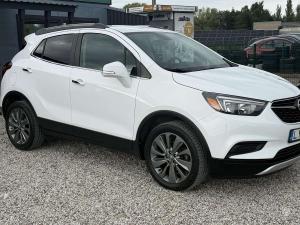 White Buick Encore 2018 in Kretinga, with an engine capacity of 1.36 L and mileage of 156 thousand km for 10750 €, photo 5 on AUTOMOTO.COM.LV