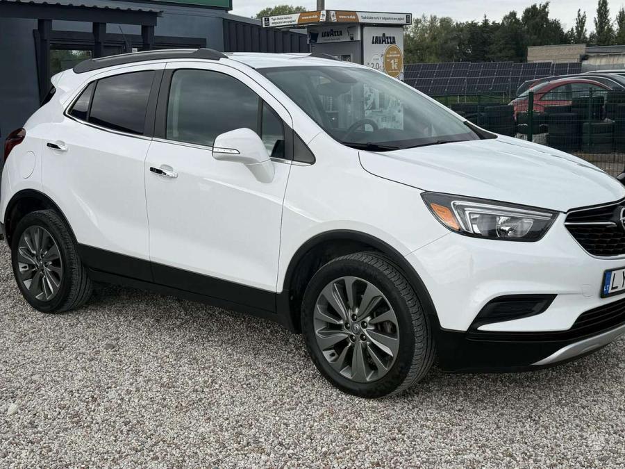 White Buick Encore 2018 in Kretinga, with an engine capacity of 1.36 L and mileage of 156 thousand km for 10750 €, photo 5 on AUTOMOTO.COM.LV