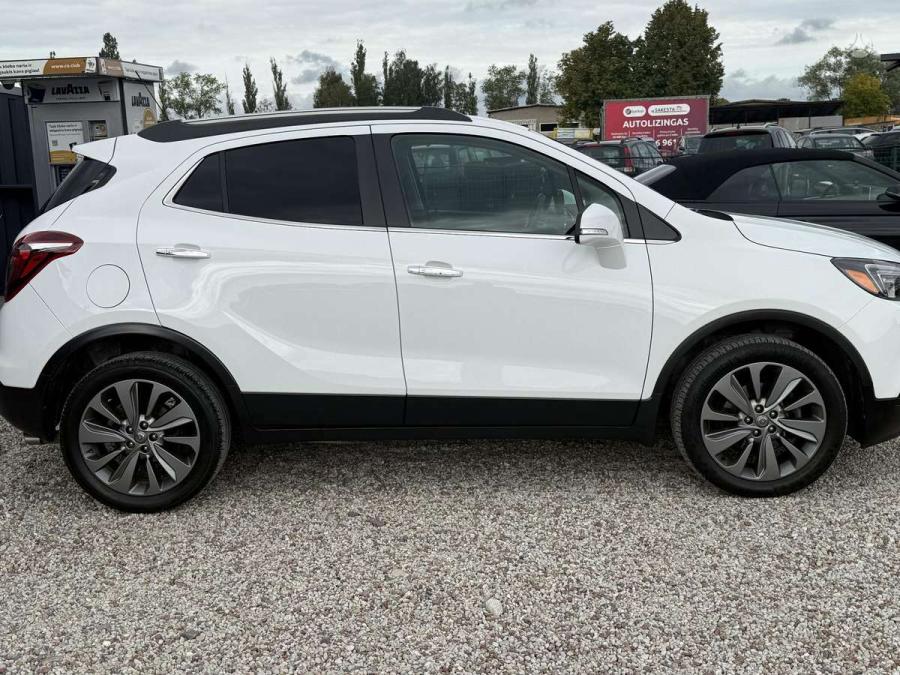 White Buick Encore 2018 in Kretinga, with an engine capacity of 1.36 L and mileage of 156 thousand km for 10750 €, photo 6 on AUTOMOTO.COM.LV