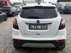 White Buick Encore 2018 in Kretinga, with an engine capacity of 1.36 L and mileage of 156 thousand km for 10750 €, photo 9 on AUTOMOTO.COM.LV