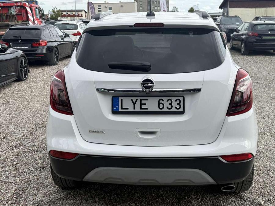 White Buick Encore 2018 in Kretinga, with an engine capacity of 1.36 L and mileage of 156 thousand km for 10750 €, photo 9 on AUTOMOTO.COM.LV