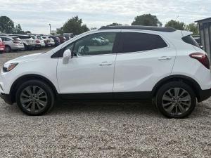 White Buick Encore 2018 in Kretinga, with an engine capacity of 1.36 L and mileage of 156 thousand km for 10750 €, photo 12 on AUTOMOTO.COM.LV
