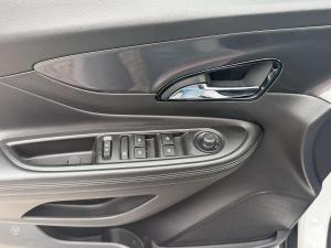 White Buick Encore 2018 in Kretinga, with an engine capacity of 1.36 L and mileage of 156 thousand km for 10750 €, photo 15 on AUTOMOTO.COM.LV