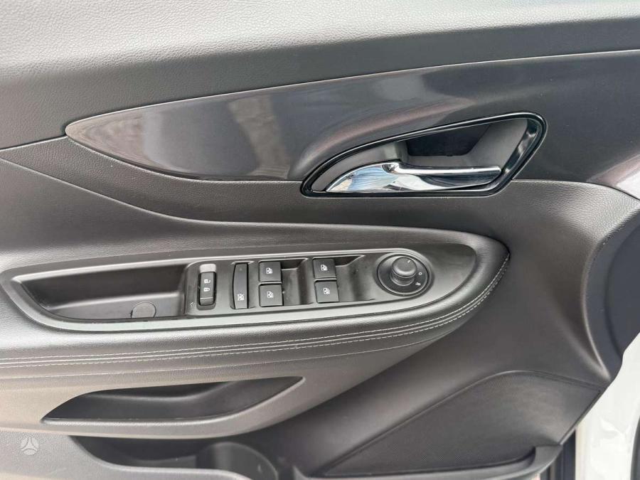 White Buick Encore 2018 in Kretinga, with an engine capacity of 1.36 L and mileage of 156 thousand km for 10750 €, photo 15 on AUTOMOTO.COM.LV