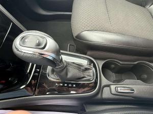 White Buick Encore 2018 in Kretinga, with an engine capacity of 1.36 L and mileage of 156 thousand km for 10750 €, photo 19 on AUTOMOTO.COM.LV