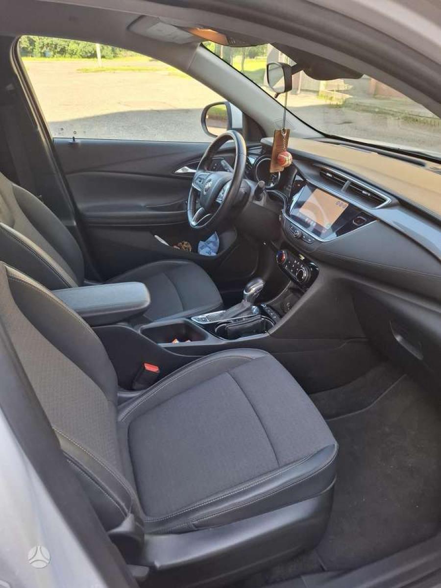 White Buick Encore 2020 in Marijampole, with an engine capacity of 1.34 L and mileage of 43 thousand km for 15200 €, photo 13 on AUTOMOTO.COM.LV