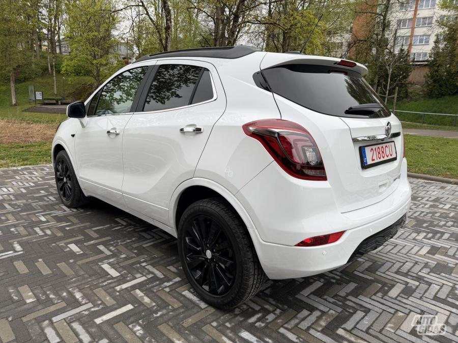 White Buick Encore 2021 in Plunge, with an engine capacity of 1.40 L and mileage of 167 thousand km for 12750 €, photo 5 on AUTOMOTO.COM.LV