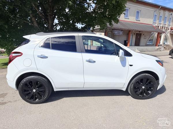 White Buick Encore 2021 in Plunge, with an engine capacity of 1.40 L and mileage of 167 thousand km for 10950 €, photo 8 on AUTOMOTO.COM.LV