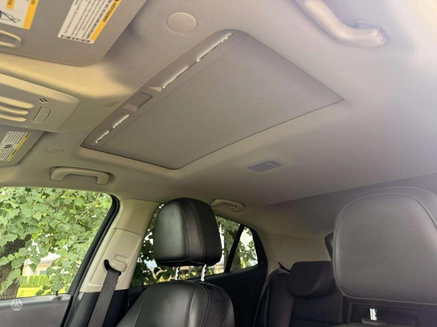 White Buick Encore 2018 in Siauliai, with an engine capacity of 1.36 L and mileage of 187 thousand km for 7500 €, photo 17 on AUTOMOTO.COM.LV