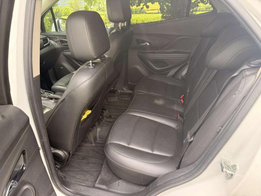 White Buick Encore 2018 in Siauliai, with an engine capacity of 1.36 L and mileage of 187 thousand km for 7500 €, photo 18 on AUTOMOTO.COM.LV