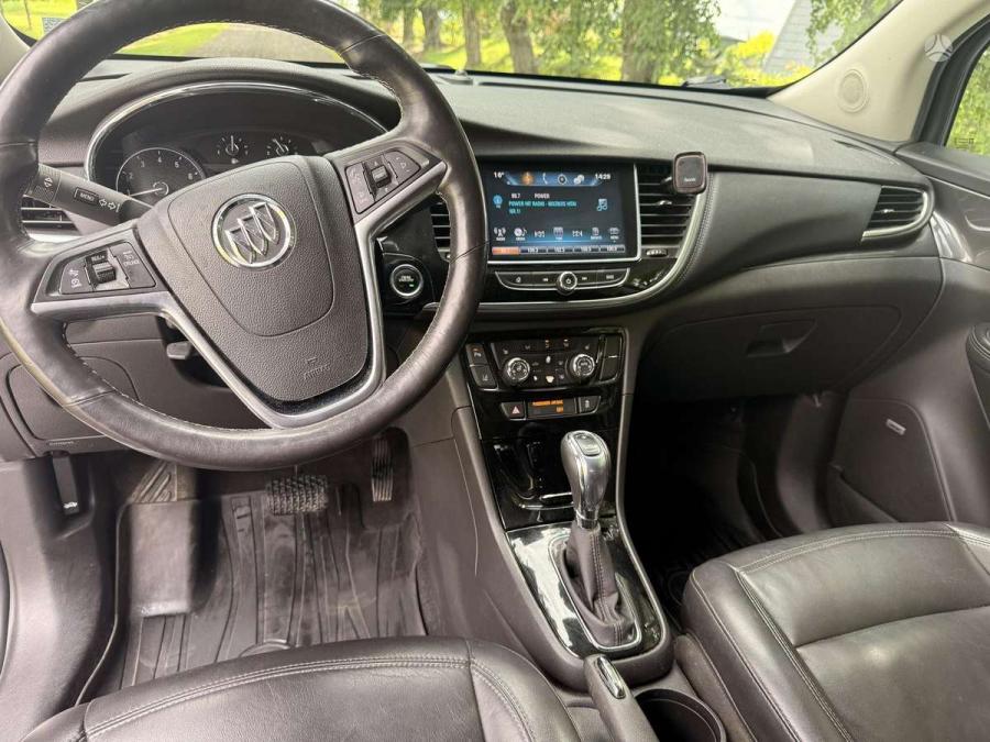 White Buick Encore 2018 in Siauliai, with an engine capacity of 1.36 L and mileage of 187 thousand km for 7500 €, photo 19 on AUTOMOTO.COM.LV