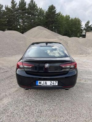 Black Buick Regal 2018 in Vilnius, with an engine capacity of 2.00 L and mileage of 53 thousand km for 12900 €, photo 5 on AUTOMOTO.COM.LV